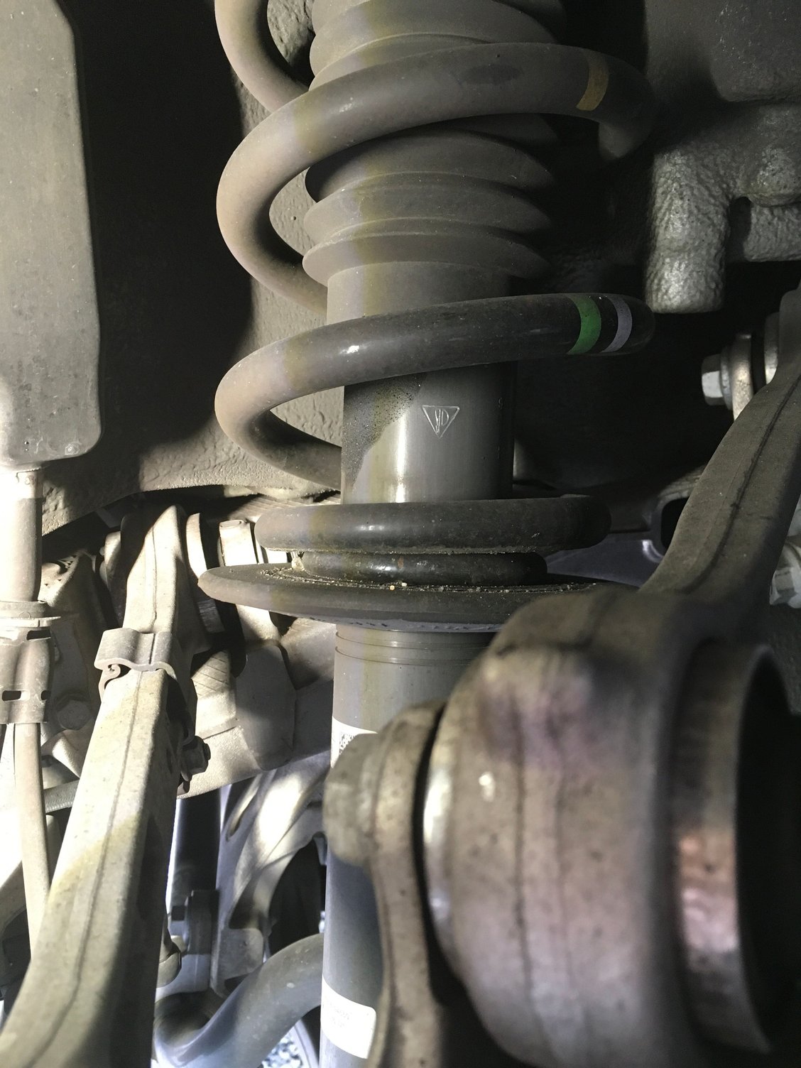 991.2 rear shocks leaking at 30Kmi - switch to Tractive? - Rennlist ...