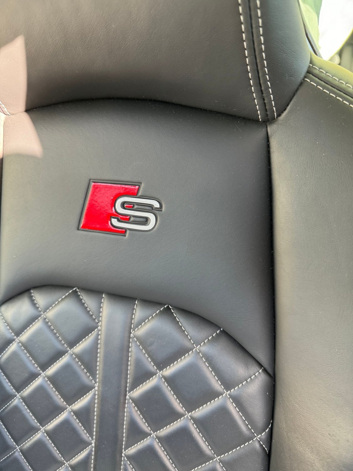 Unique colored S line seat emblem - AudiWorld Forums