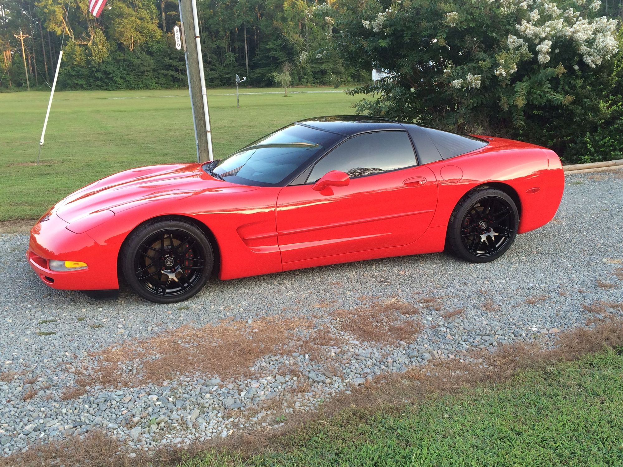 Show me your torch red c5 with black or gun metal wheels ...