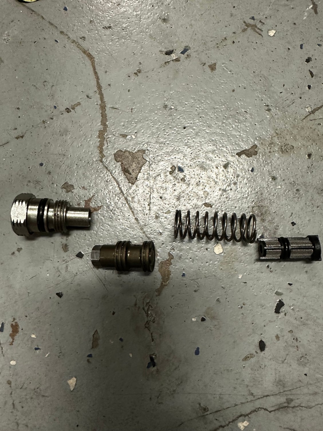 Power steering pump spring, filter, and control flow order ...