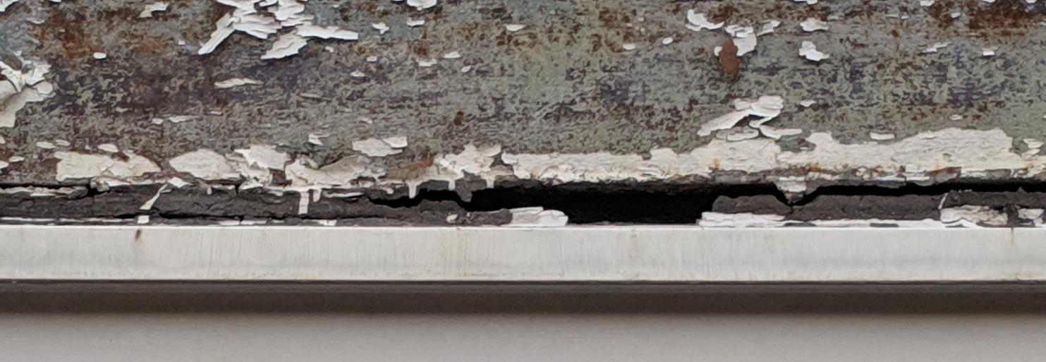 Best way to fill 3 inch gap between top of garage door frame and joist ...