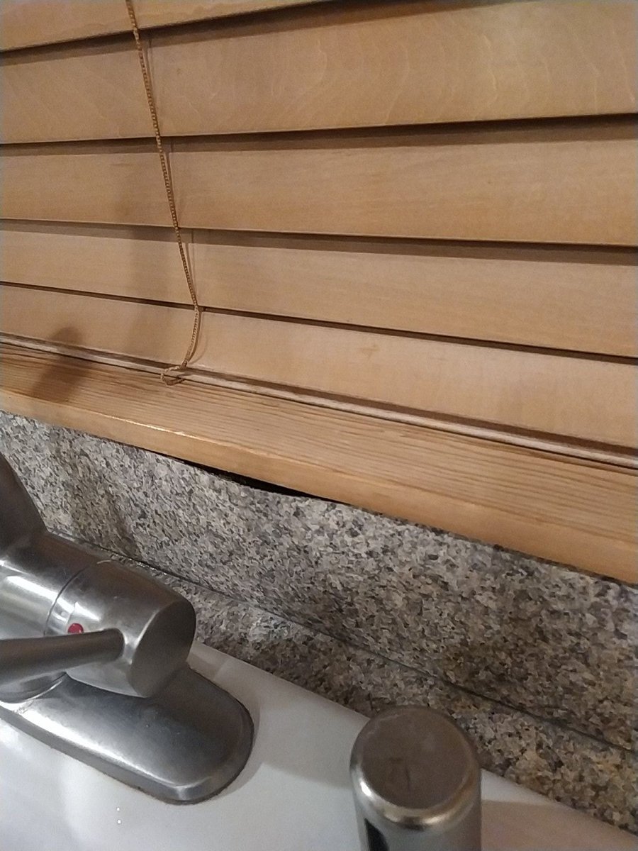 Loose laminate on backsplash - DoItYourself.com Community Forums