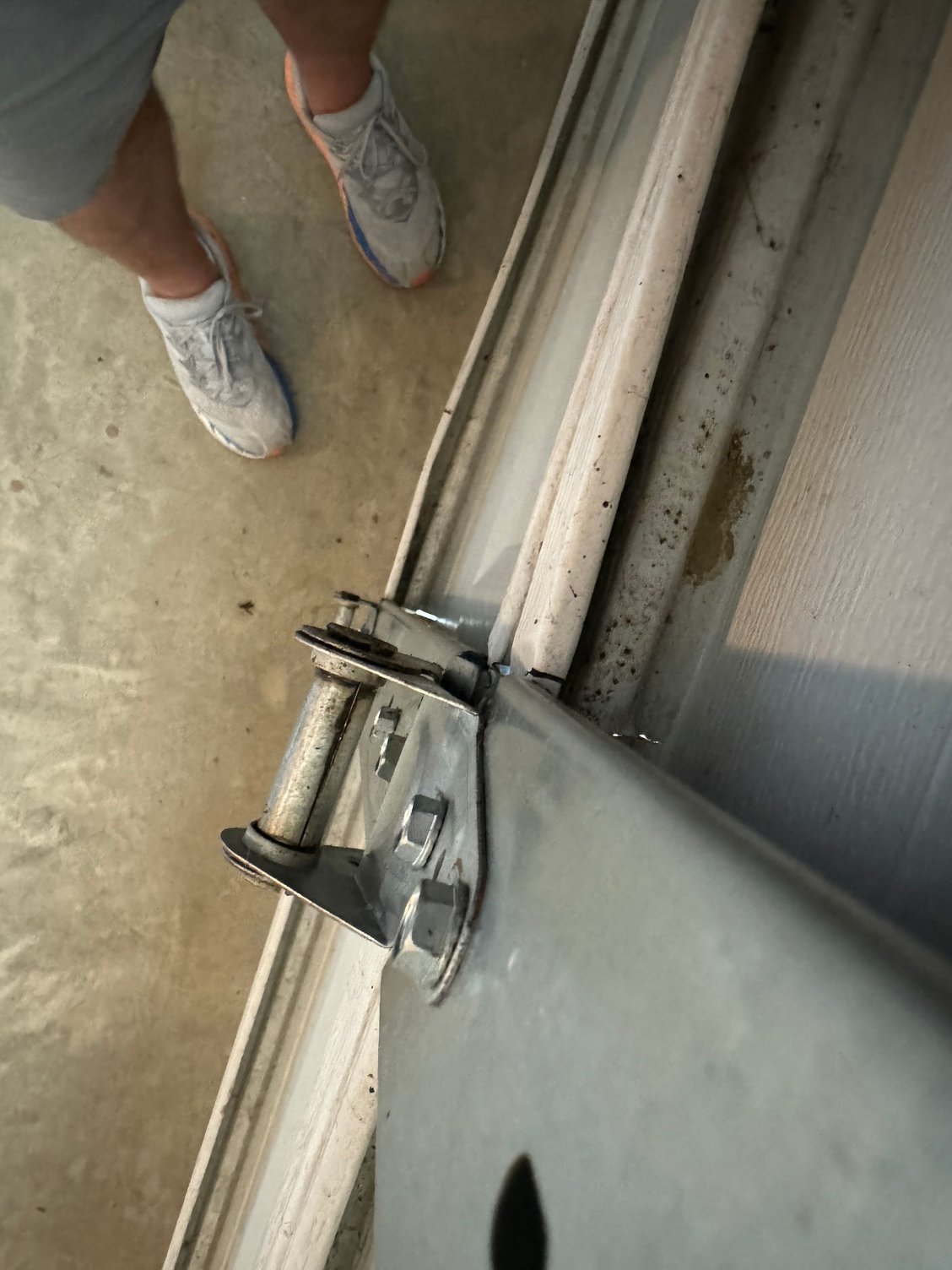 Garage door buckled - DoItYourself.com Community Forums