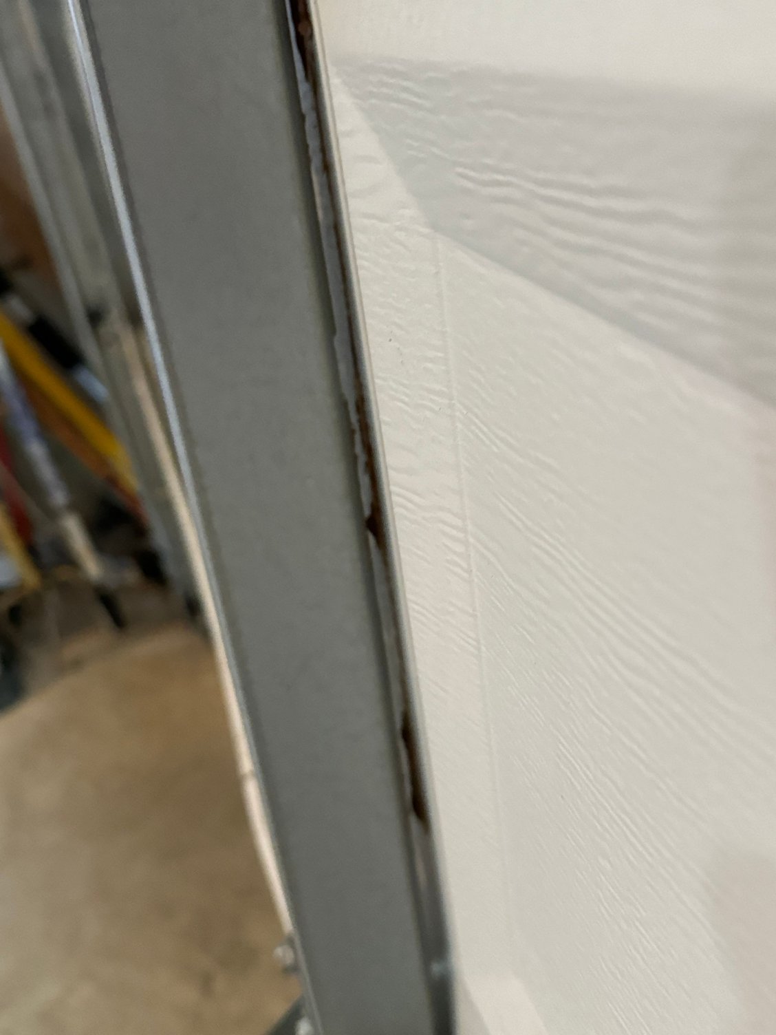 Garage door buckled - DoItYourself.com Community Forums