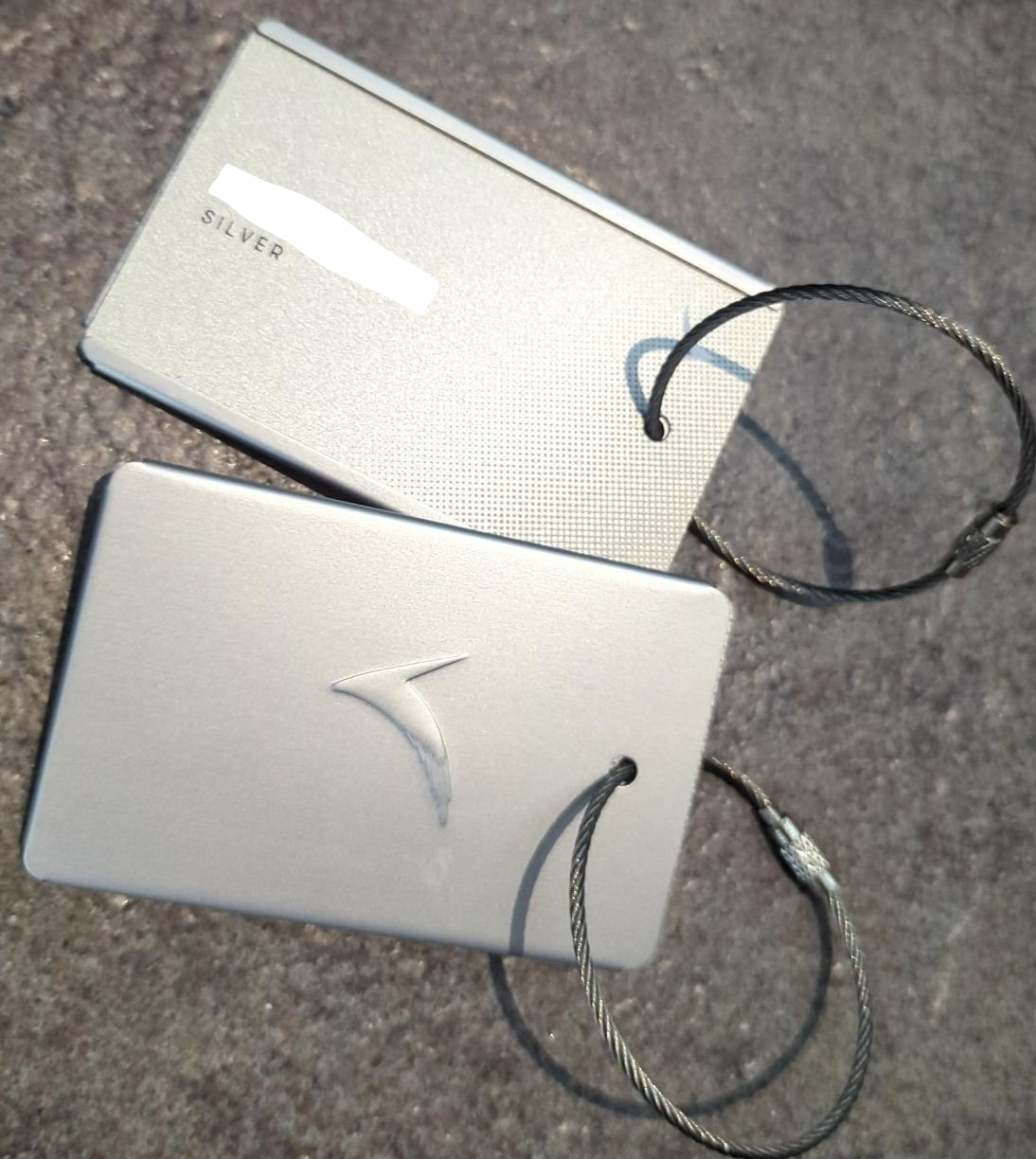 Anybody used the new metal luggage tags yet? - Page 3 - FlyerTalk Forums