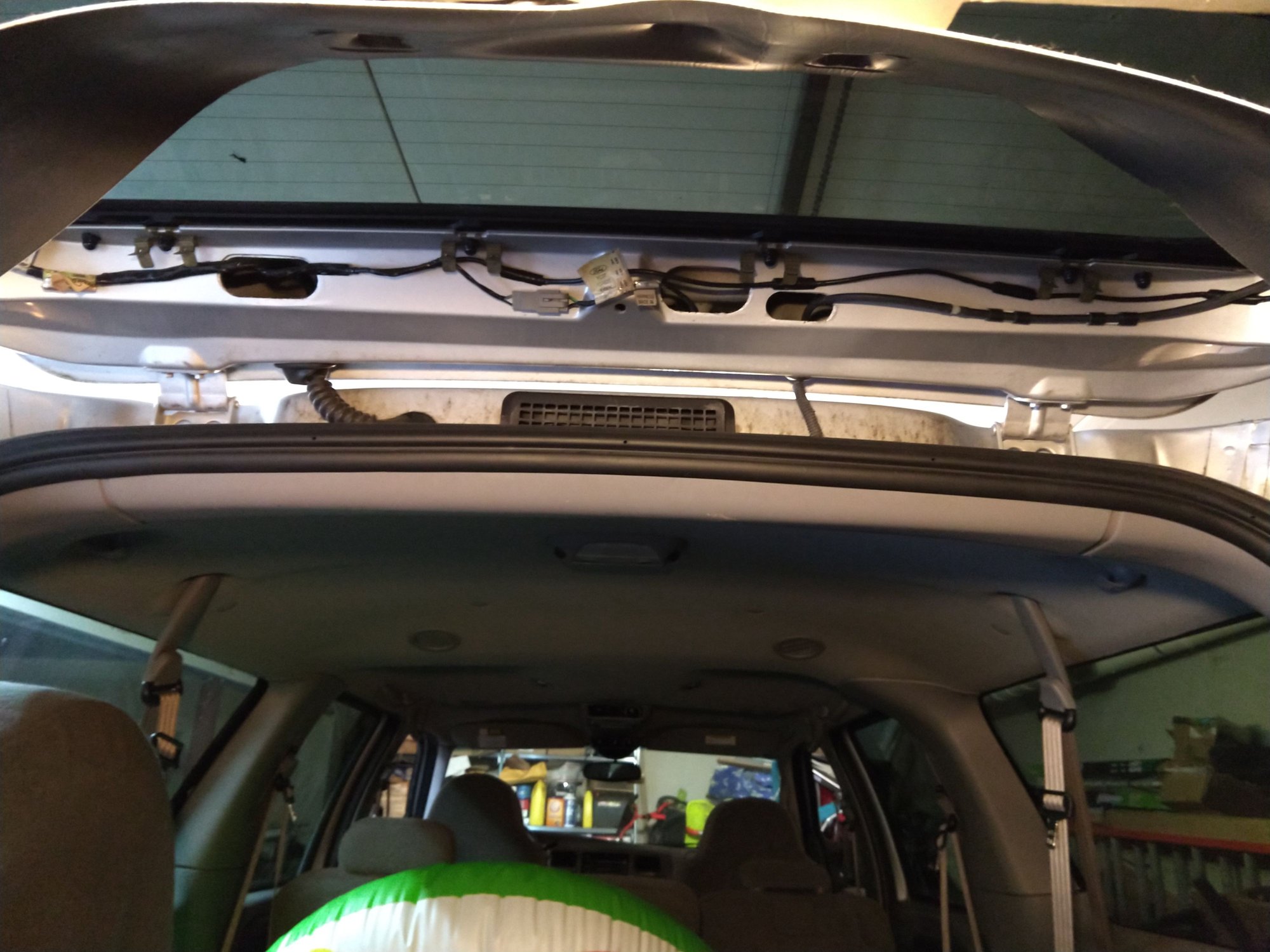 How to remove Excursion rear hatch trim and replace rear defroster tab ...